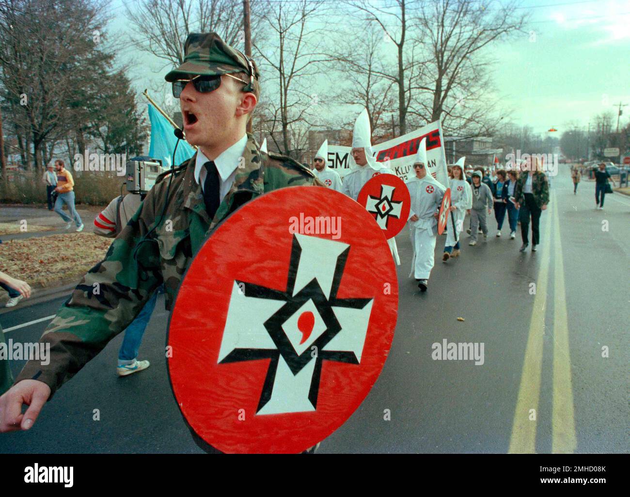 Members of the Ku Klux Klan march past the Giles County courthouse in ...