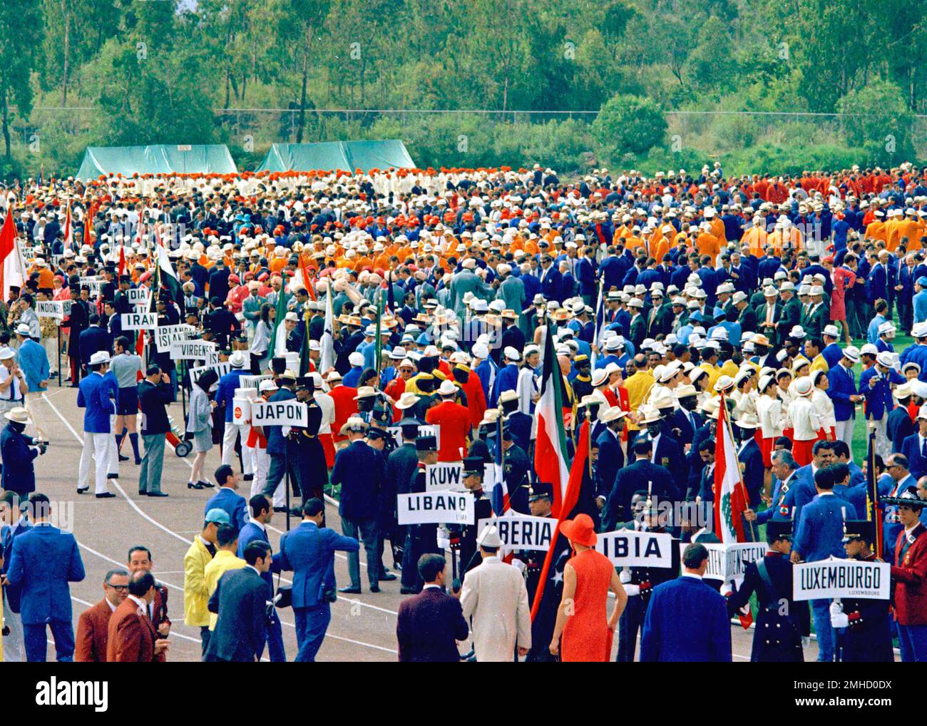 The Parade of Nations, opening the games of the XIX Olympiad, is shown ...