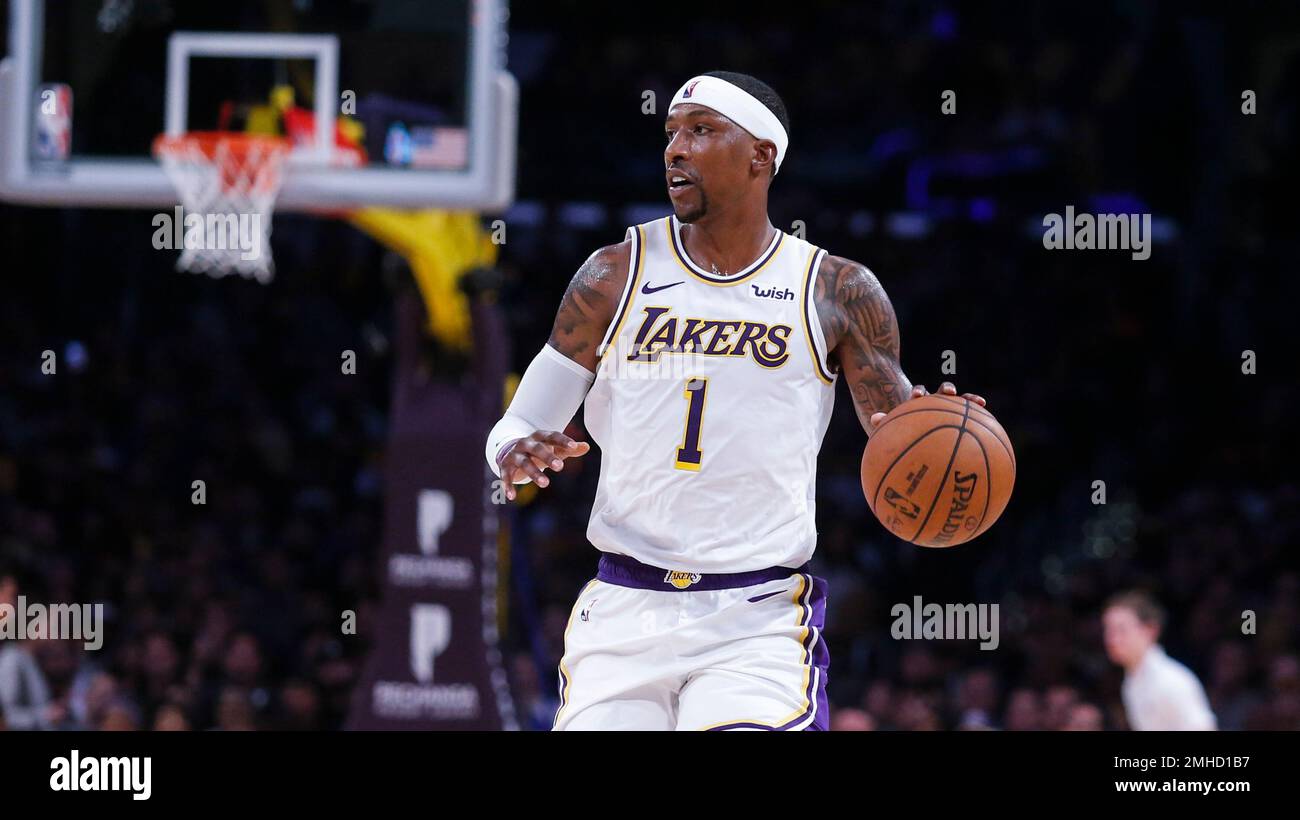 Los Angeles Lakers' Kentavious Caldwell-Pope (1) dribbles during an NBA ...