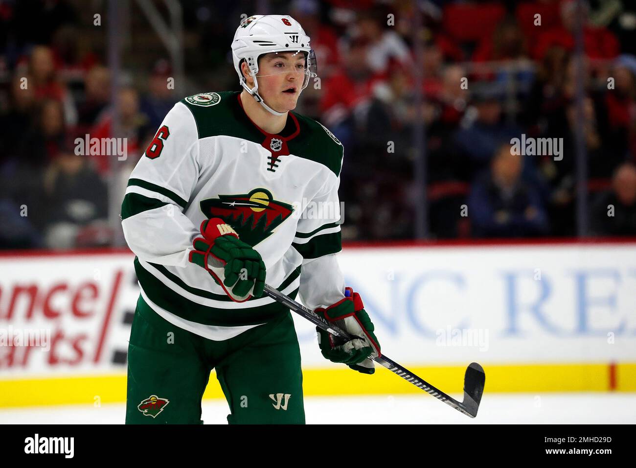 Minnesota Wild's Ryan Donato (6) eyes the puck against the Carolina ...