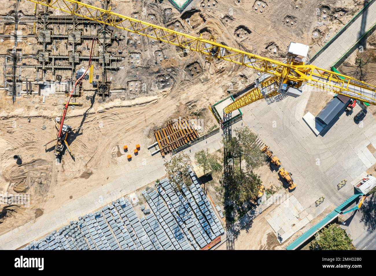 construction site view from above. working concrete pumping machine and ...