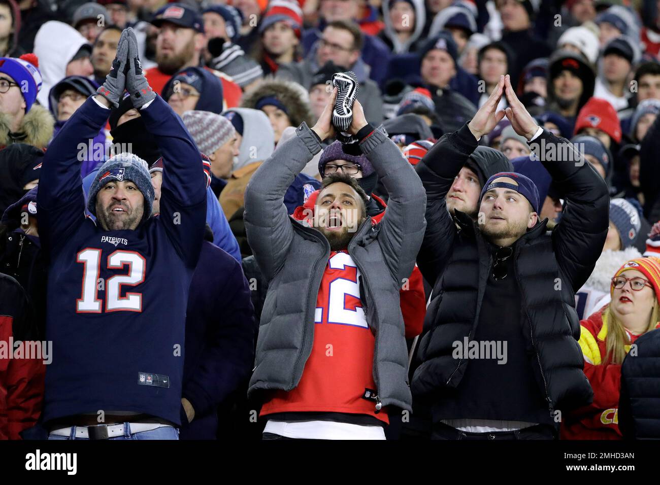 New England Patriots fans exhort their team in the second half of an ...
