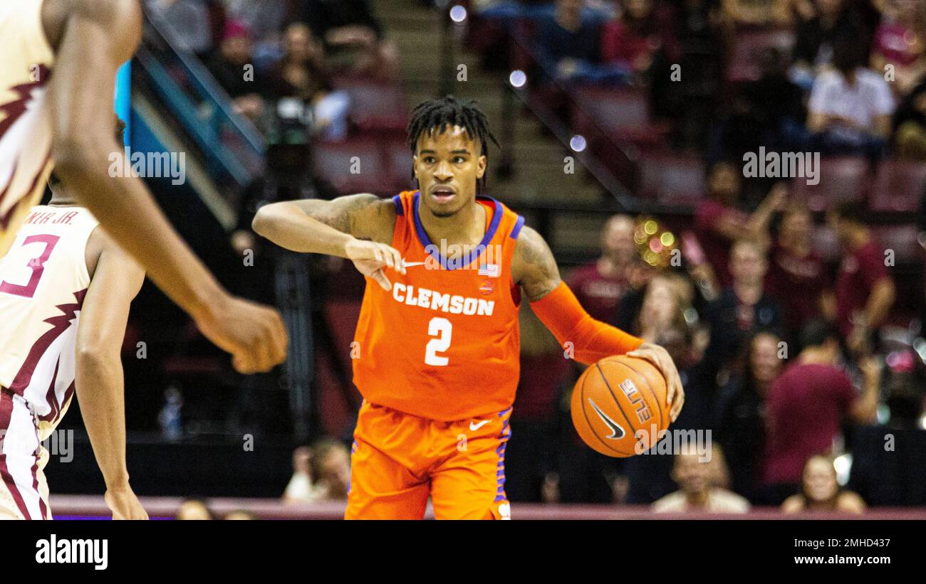 Clemson guard Al Amir Dawes brings the ball up court in the first half ...