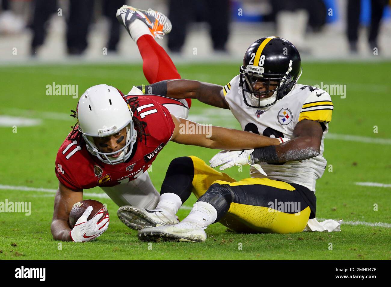 Arizona Cardinals wide receiver Larry Fitzgerald (11) is tackled by ...
