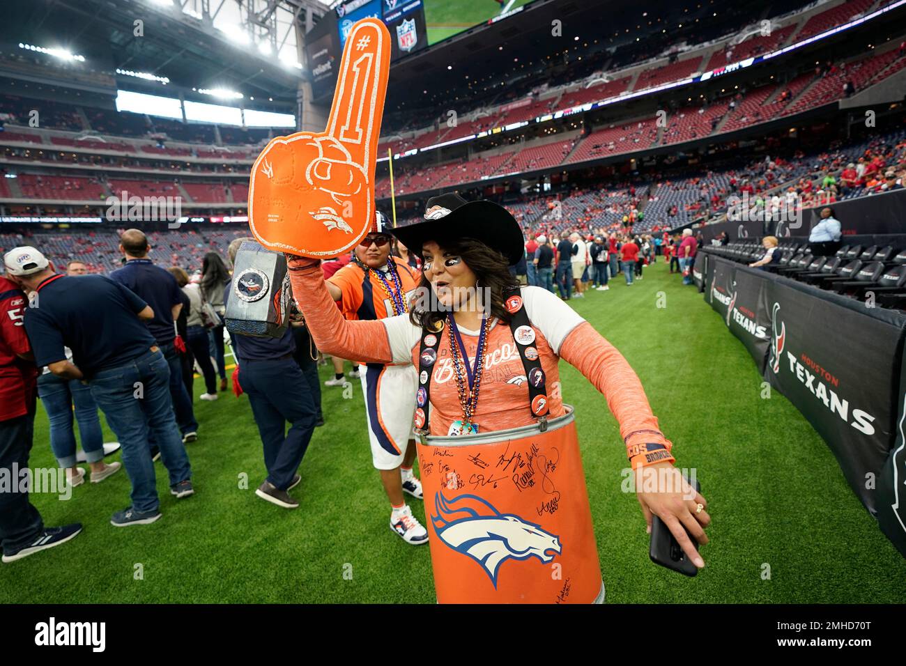 Fans arrive for an NFL football game between the Houston Texans and the ...
