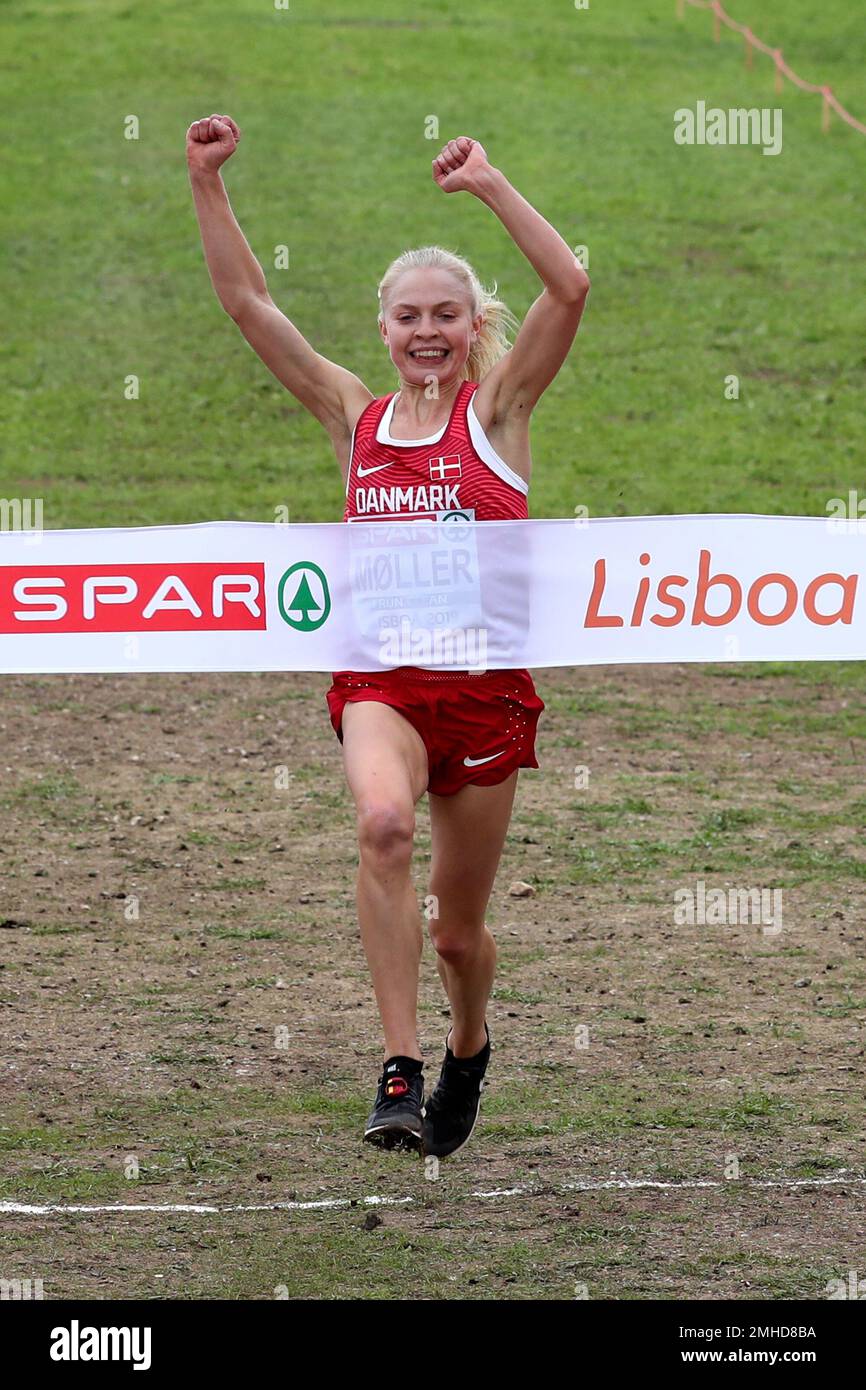 Anna Emilie Moller of Denmark crosses the finish line to win the Under ...