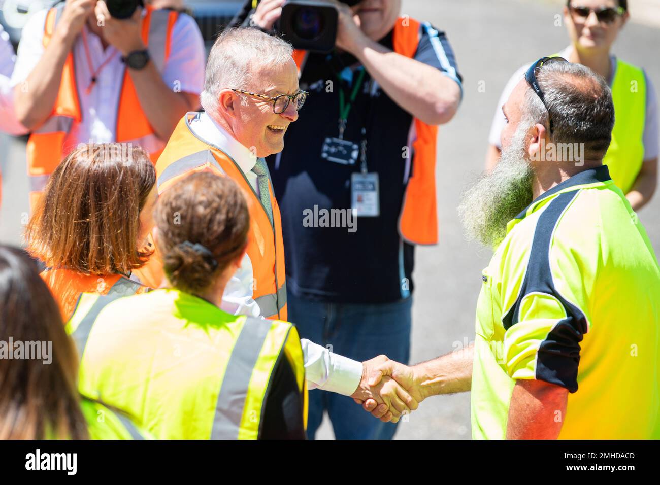 Australian Prime Minister Anthony Albanese meets employees during a ...