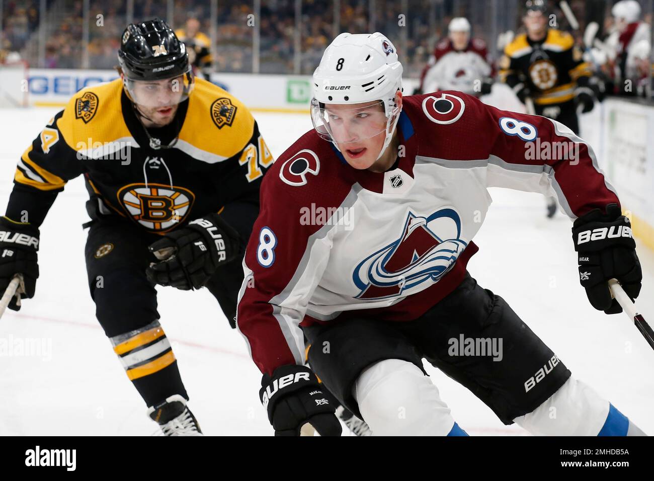 Boston Bruins' Jake DeBrusk (74) pursues Colorado Avalanche's Cale ...