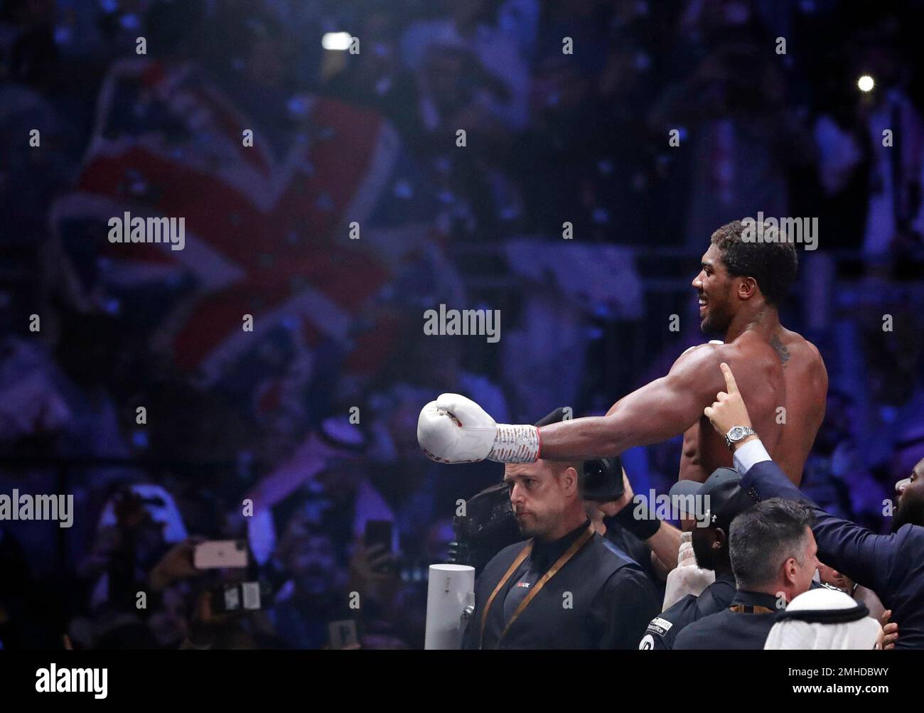 Britain's Anthony Joshua celebrates after beating Andy Ruiz Jr. to win ...