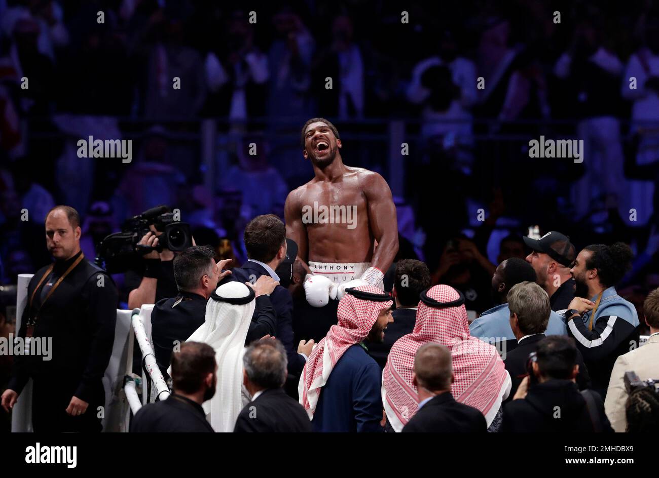 Britain's Anthony Joshua celebrates after beating Andy Ruiz Jr. to win ...