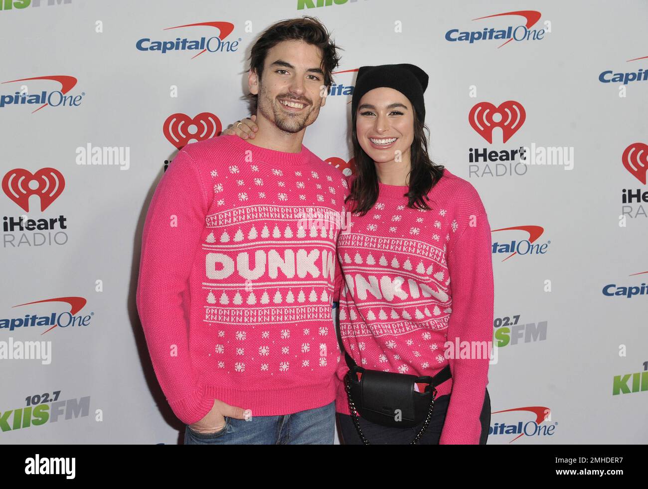 Jared Haibon, left, and Ashley Iaconetti arrive at Jingle Ball on ...
