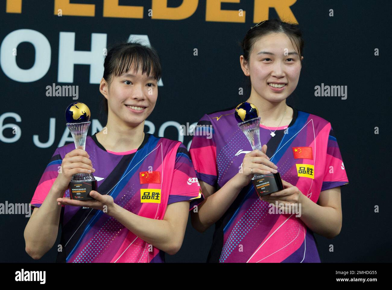 Doha, Qatar. 26th Jan, 2023. Gold medalists Qian Tianyi(R)/Shi Xunyao ...