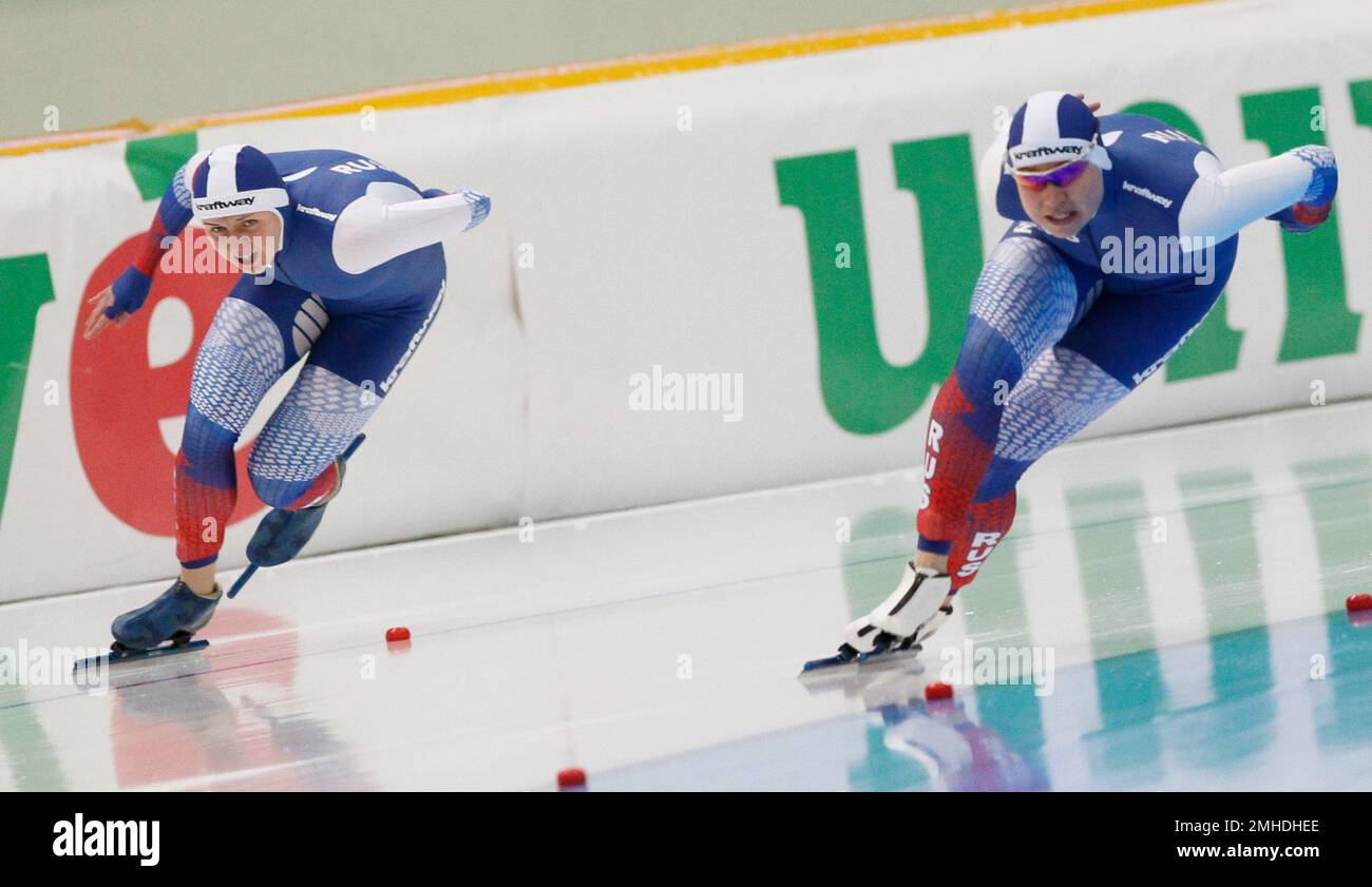 Daria Kachanova, left, and Olga Fatkulina of Russia compete during the ...