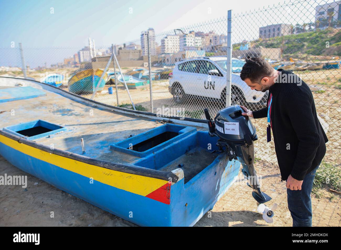 Gaza, Palestine. 26th Jan, 2023. A UN employee checks the new engine on ...