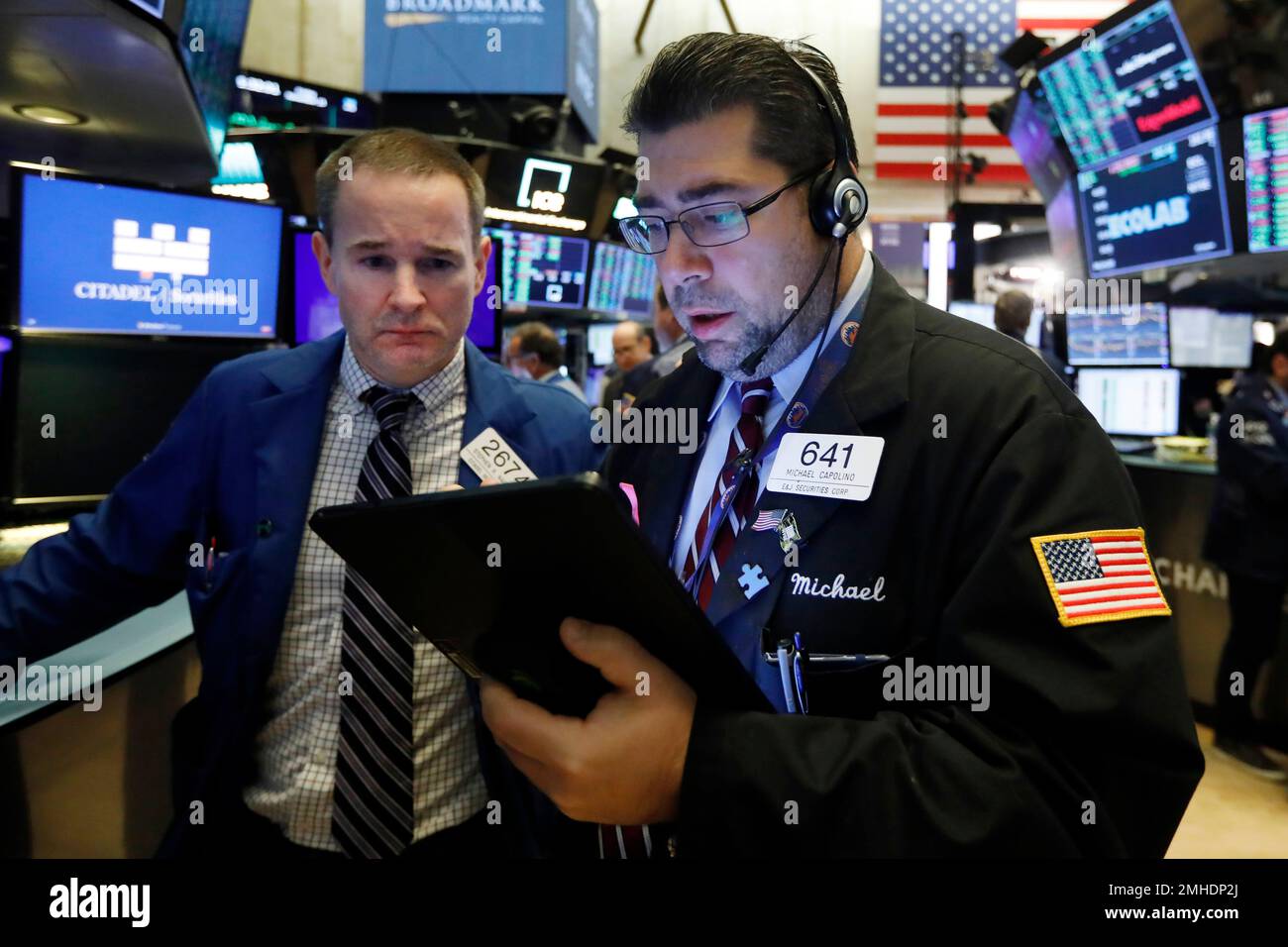 FILE - In this Nov. 15, 2019, file photo specialist Stephen Naughton ...