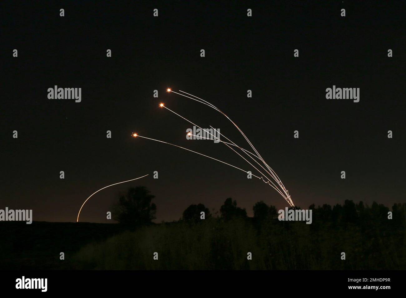 The Israeli Iron Dome air defense system takes out rockets fired from ...