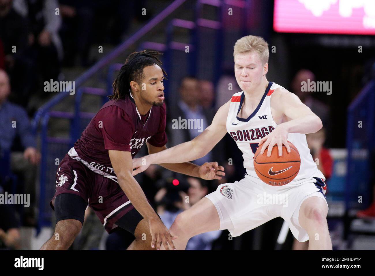 Gonzaga guard Martynas Arlauskas, right, dribbles the ball while pressured by Texas Southern ...