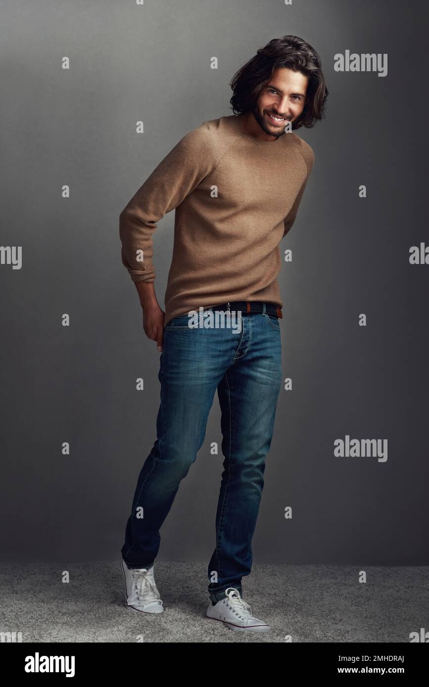 Meet Mr Handsome. Studio shot of a handsome young man posing against a ...