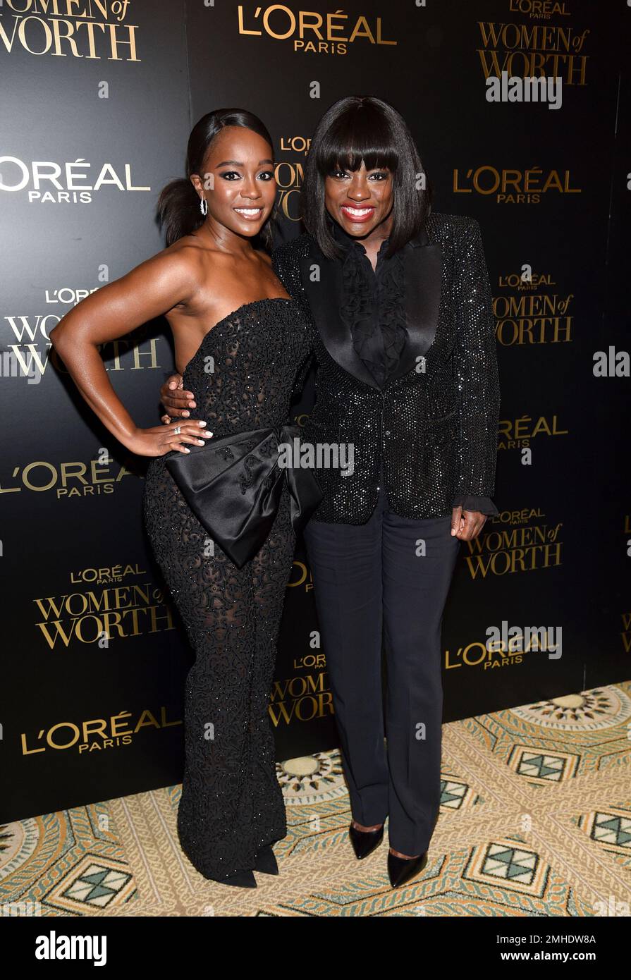 Actors Aja Naomi King, left, and Viola Davis pose together at the 14th ...