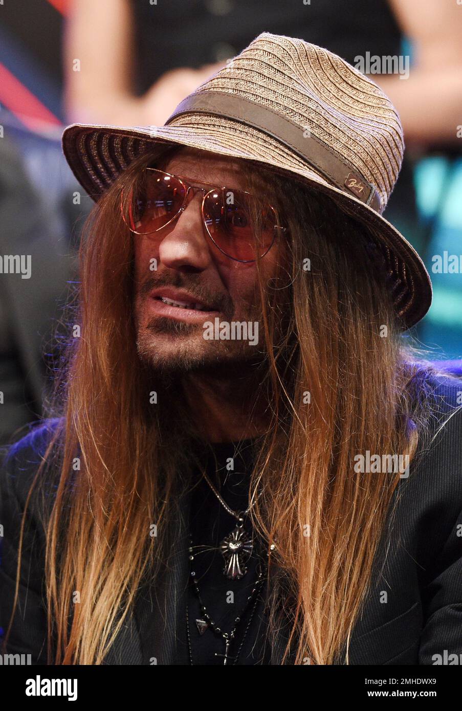 C.C. DeVille of Poison looks on during a news conference to announce ...