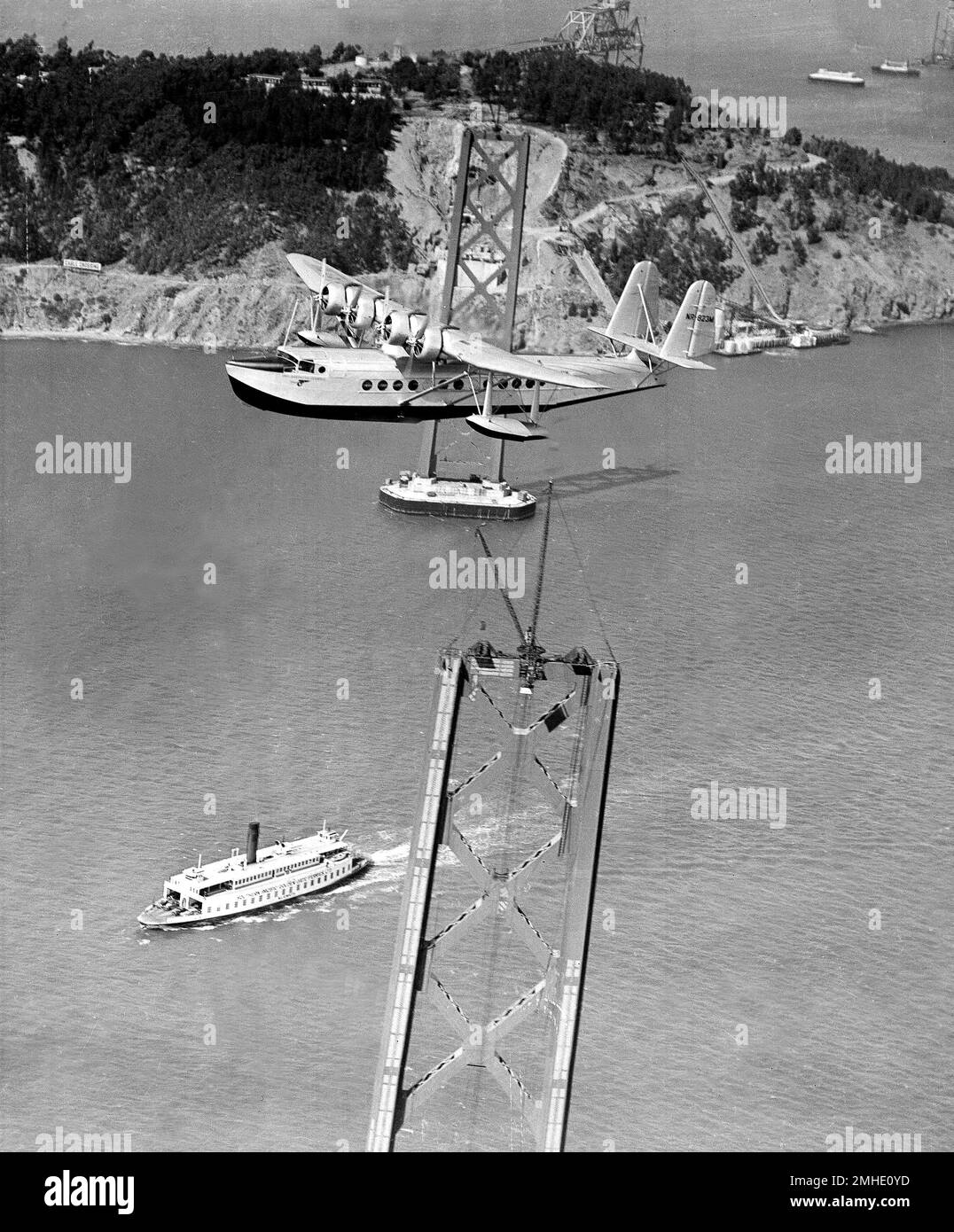 With the unfinished San Francisco Bay Bridge below, the Pan American ...