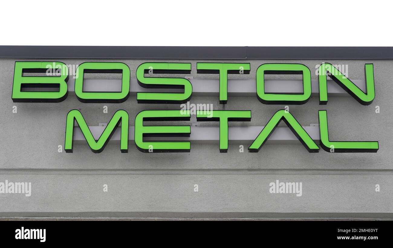A Boston Metal sign is attached to a building at the company, Wednesday ...