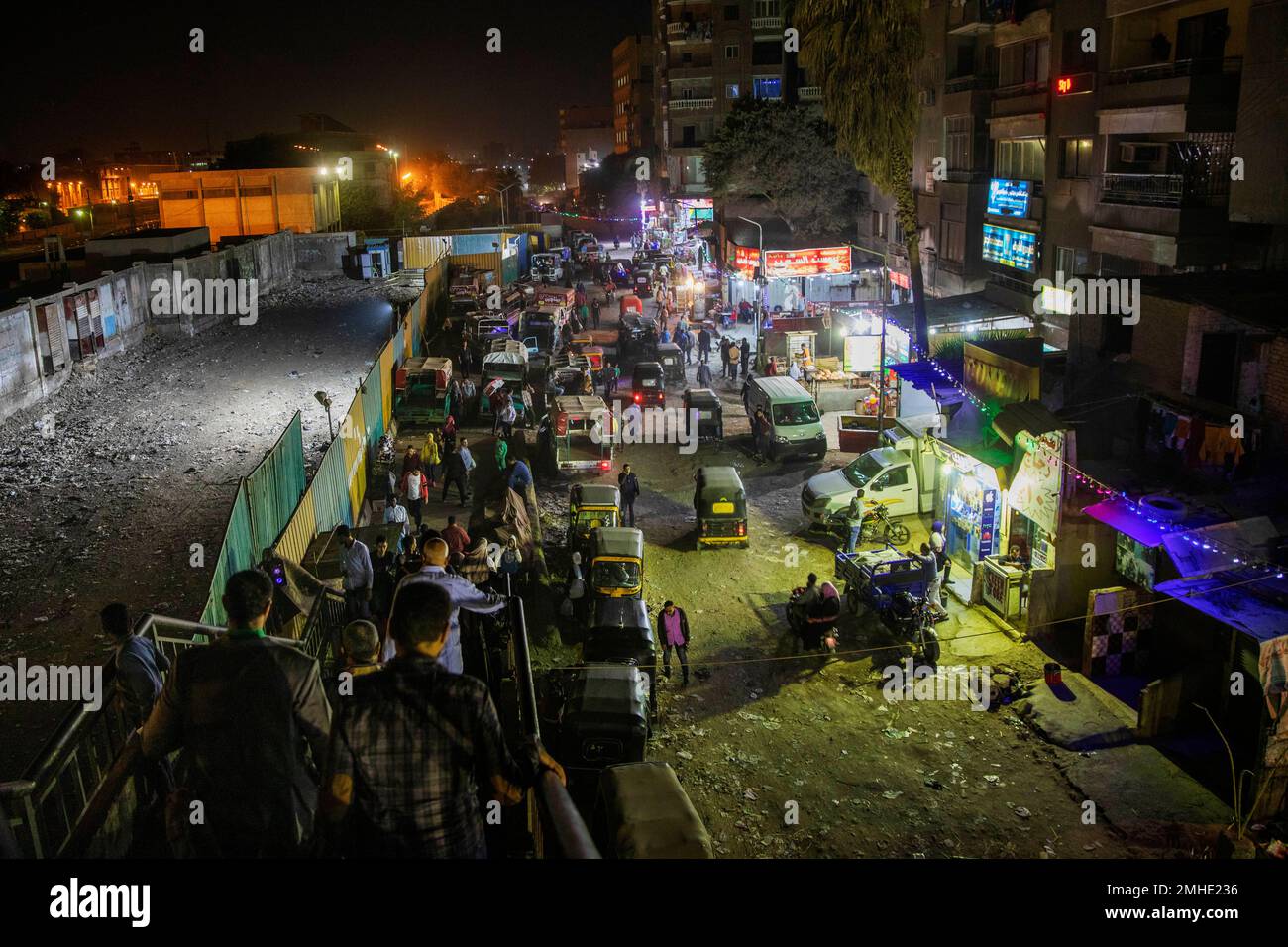 In this Nov. 24, 2019 photo, tuk-tuk drivers make their way on a ...