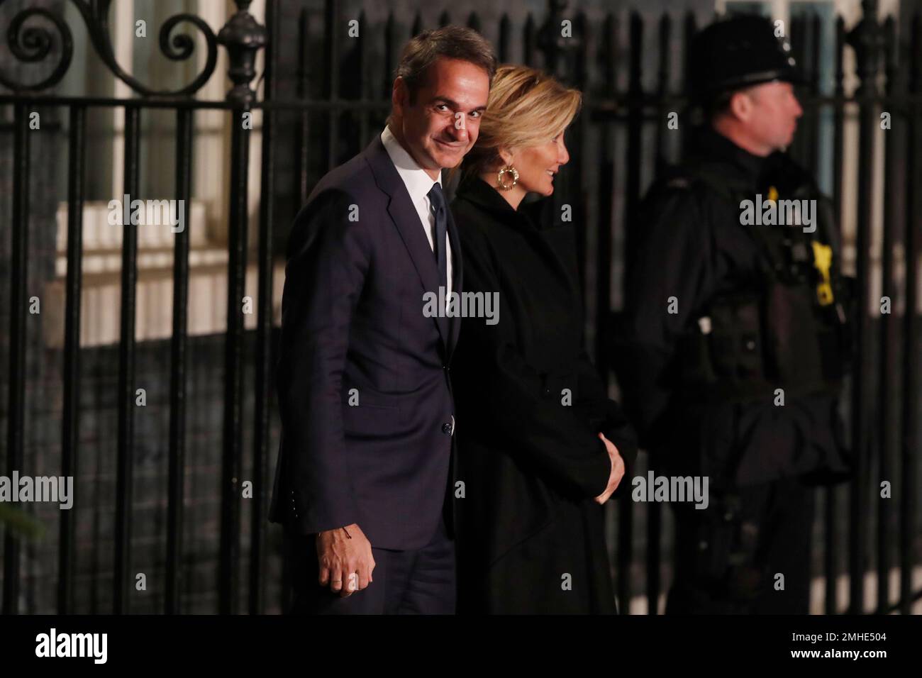 Greek Prime Minister Kyriakos Mitsotakis, left, and his wife Mareva ...