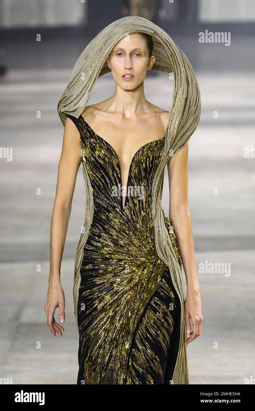 Anna Cleveland walks the runway during the Gaurav Gupta Haute Couture ...