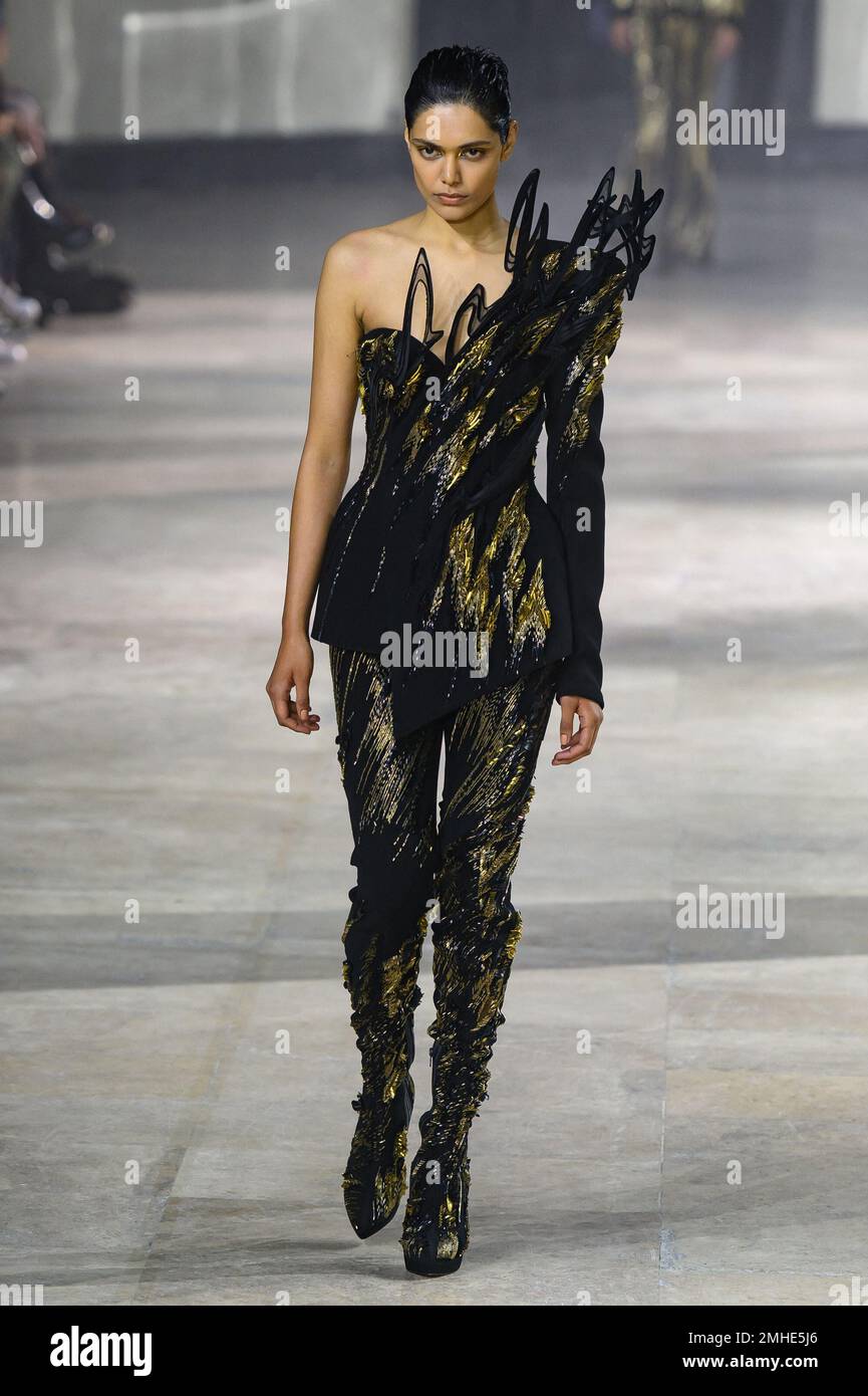 A model walks the runway during the Gaurav Gupta Haute Couture 2023 ...