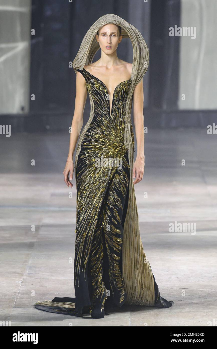 Anna Cleveland walks the runway during the Gaurav Gupta Haute Couture ...