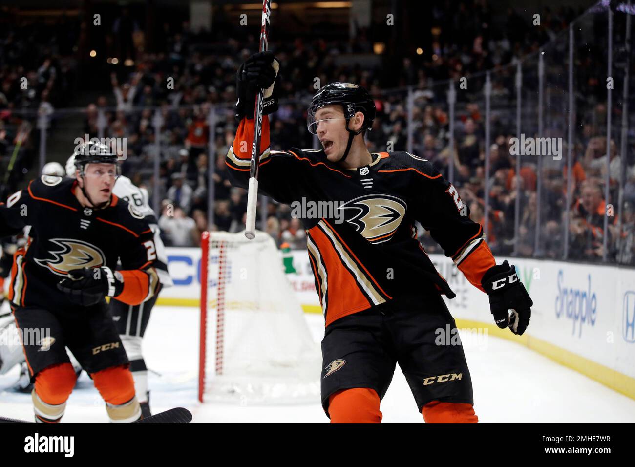 Anaheim Ducks' Carter Rowney, right, celebrates after scoring against ...