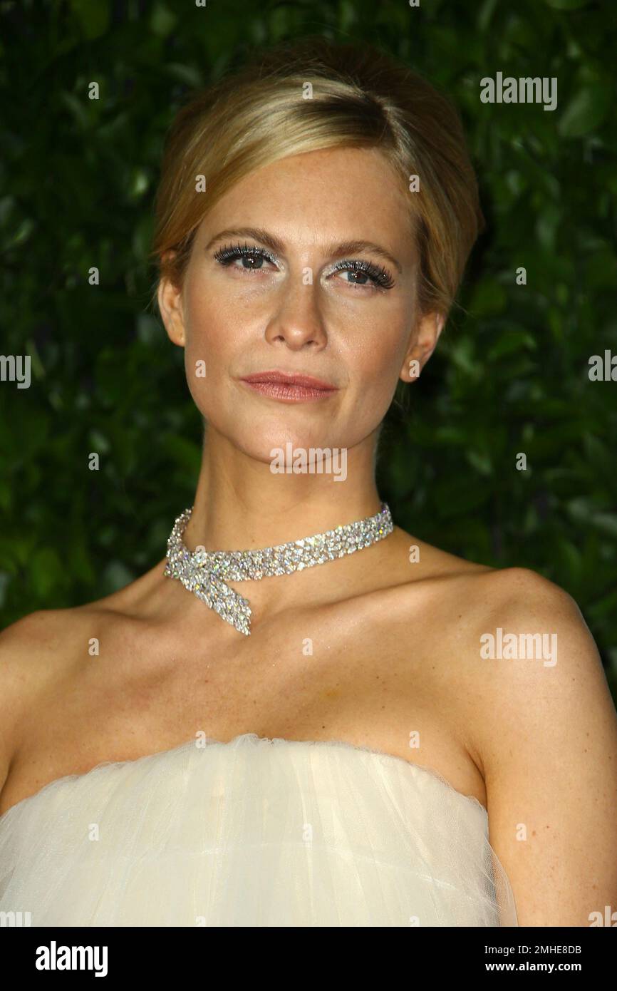 Poppy Delevingne poses for photographers upon arrival at the British ...