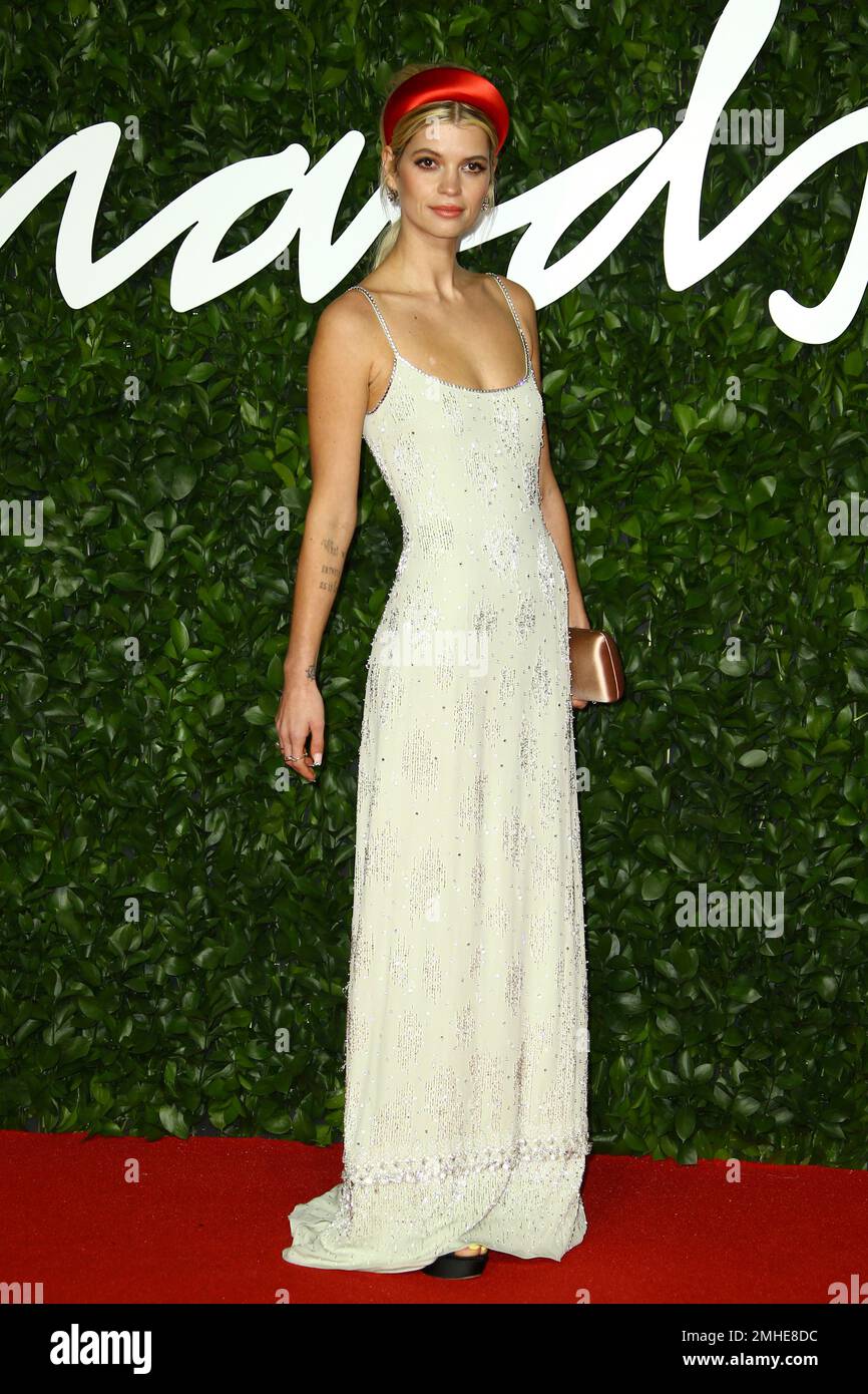 Pixie Geldof poses for photographers upon arrival at the British Fashion Awards in central ...