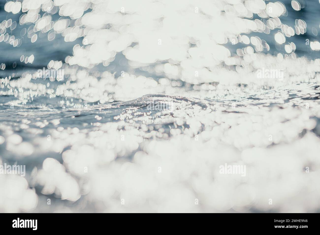 Abstract sea summer ocean sunset nature background. Small waves on ...