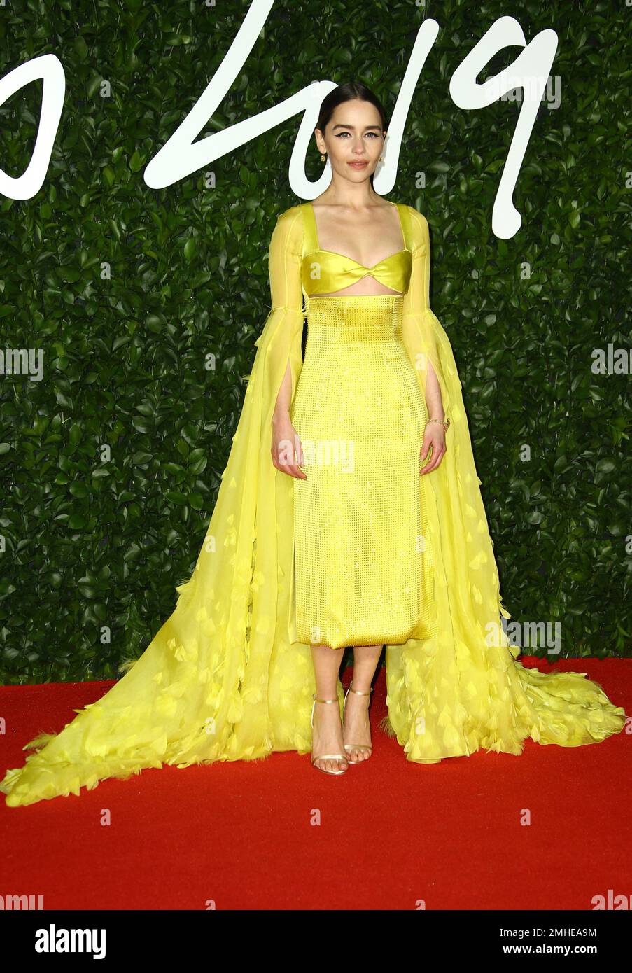 Actress Emilia Clarke poses for photographers upon arrival at the British Fashion Awards in ...