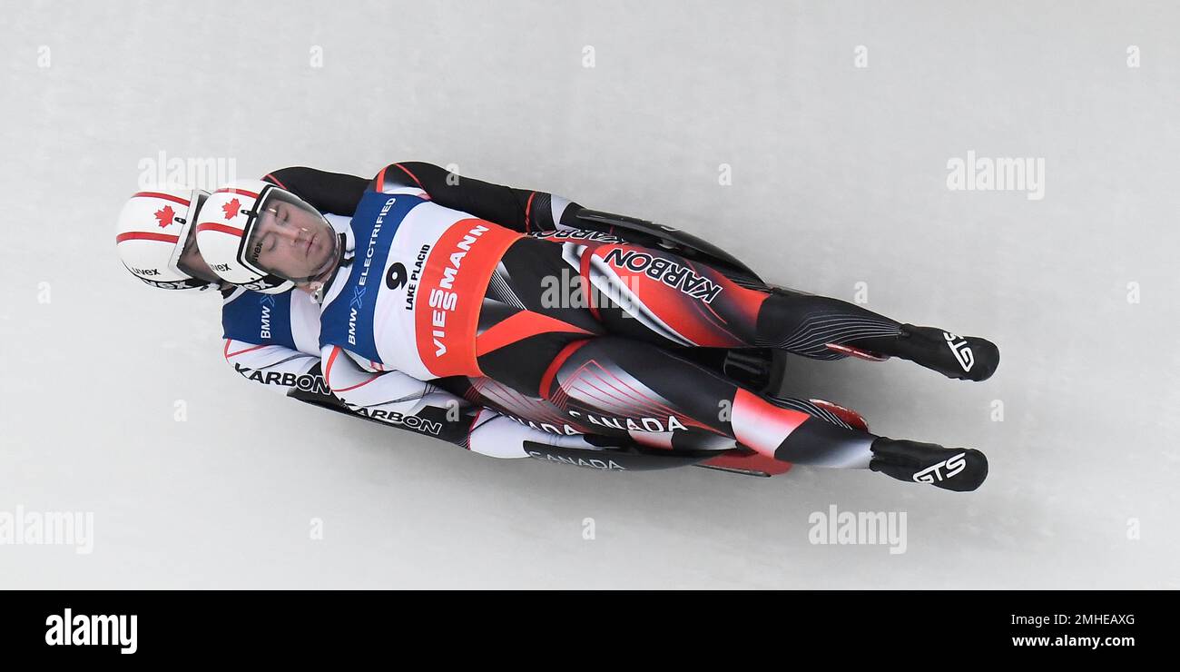 Tristan Walker and Justin Snith, of Canada, ?take a curve in the sprint ...