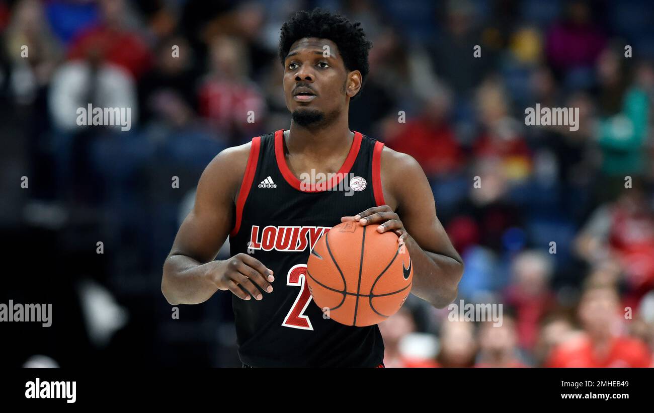 Louisville guard Darius Perry (2) plays against Western Kentucky during ...