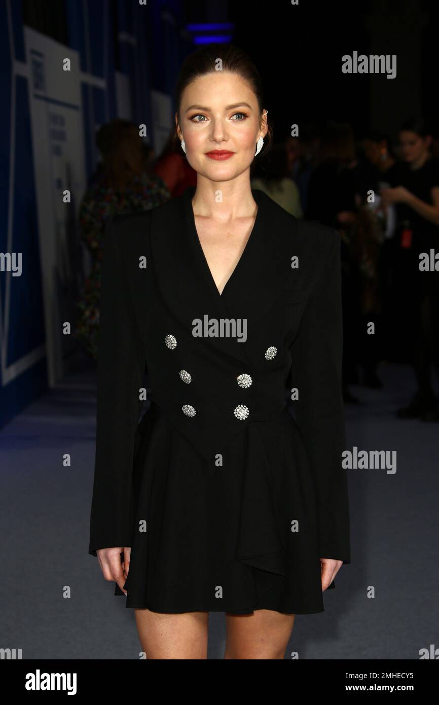 Actress Holliday Grainger poses for photographers upon arrival at the ...
