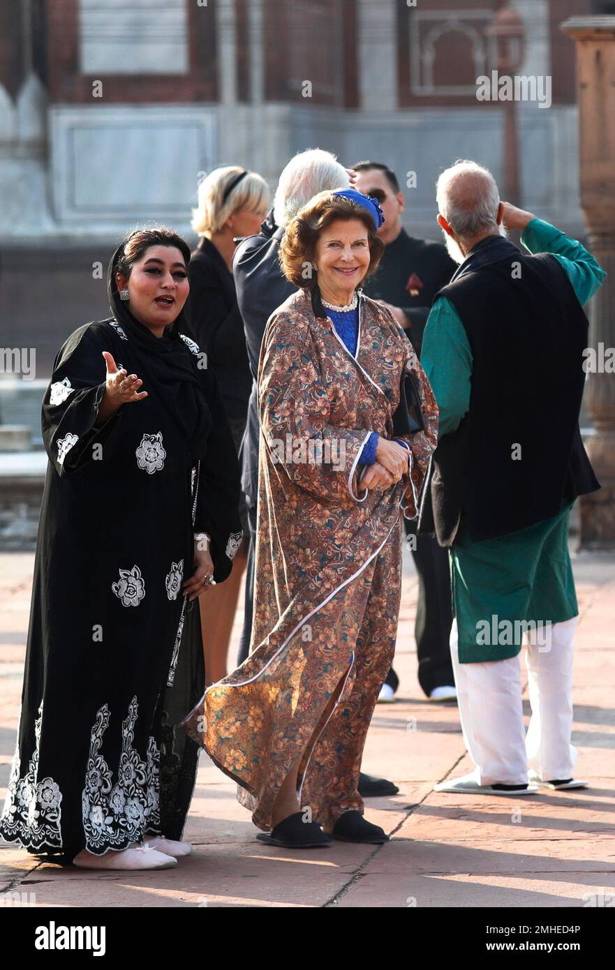 Shazia Bukhari, wife of Deputy Imaam Syed Shaban Bukhari, left, talks ...