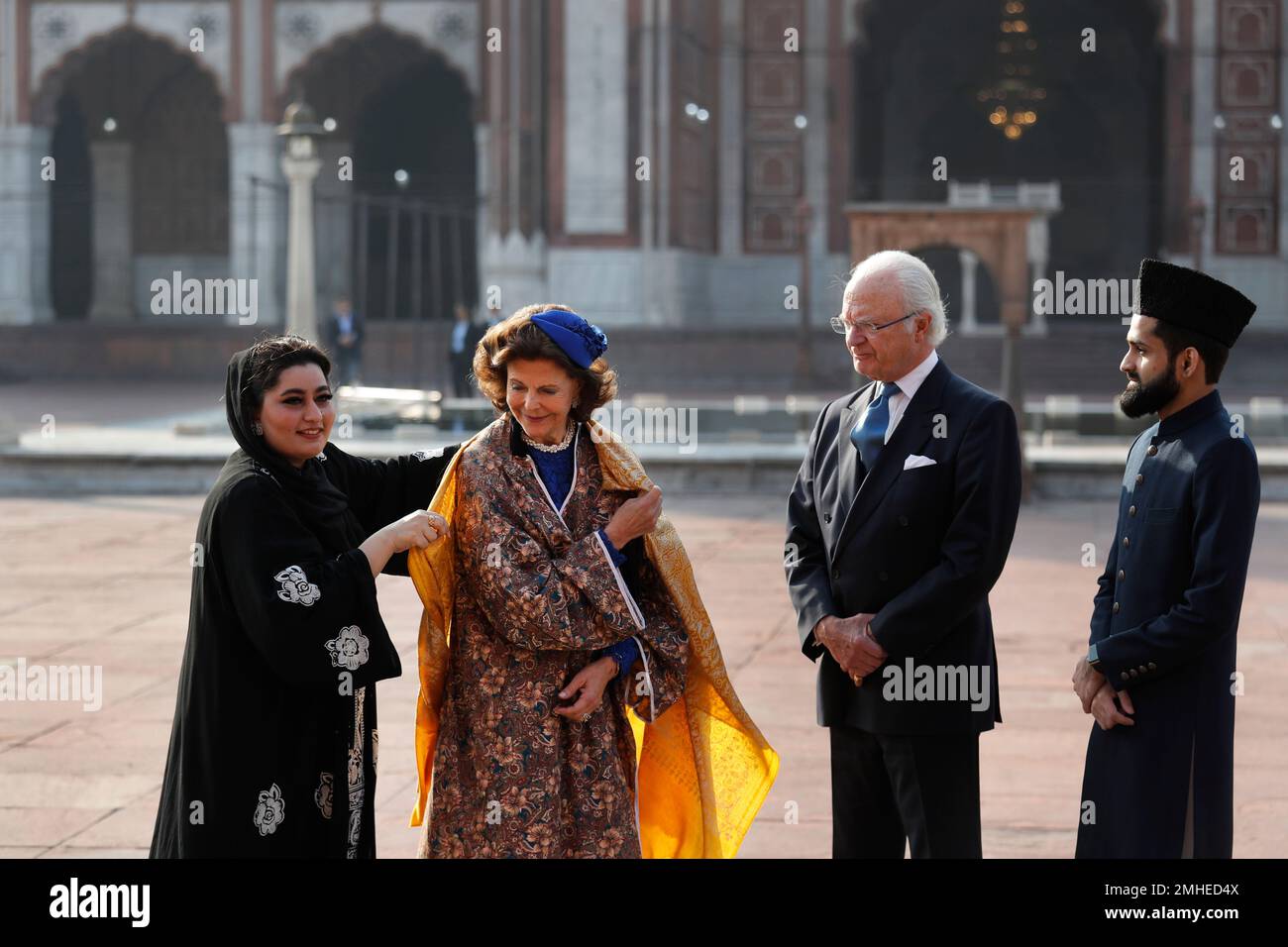 Shazia Bukhari, wife of Deputy Imaam Syed Shaban Bukhari, presents a ...