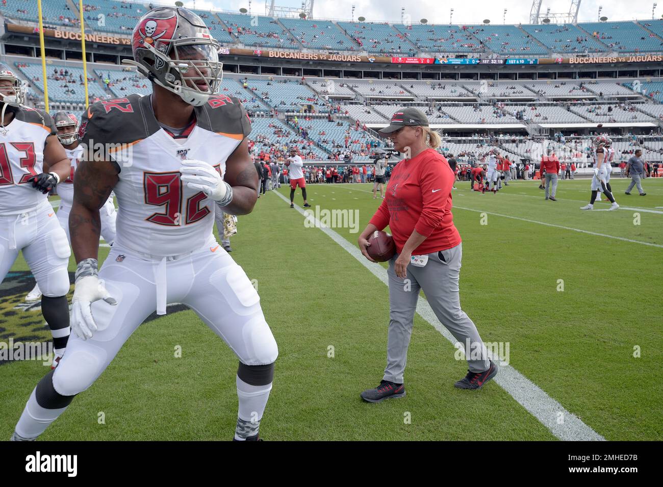 Tampa Bay Buccaneers assistant defensive line coach Lori Locust, right ...