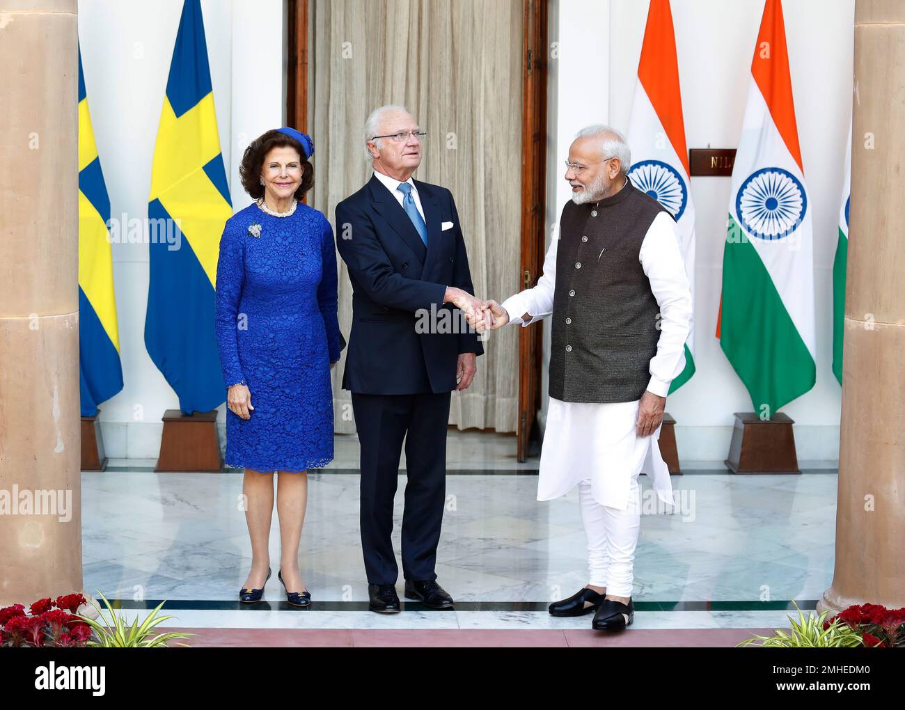 Indian Prime Minister Narendra Modi, right, shakes hands with Sweden's ...