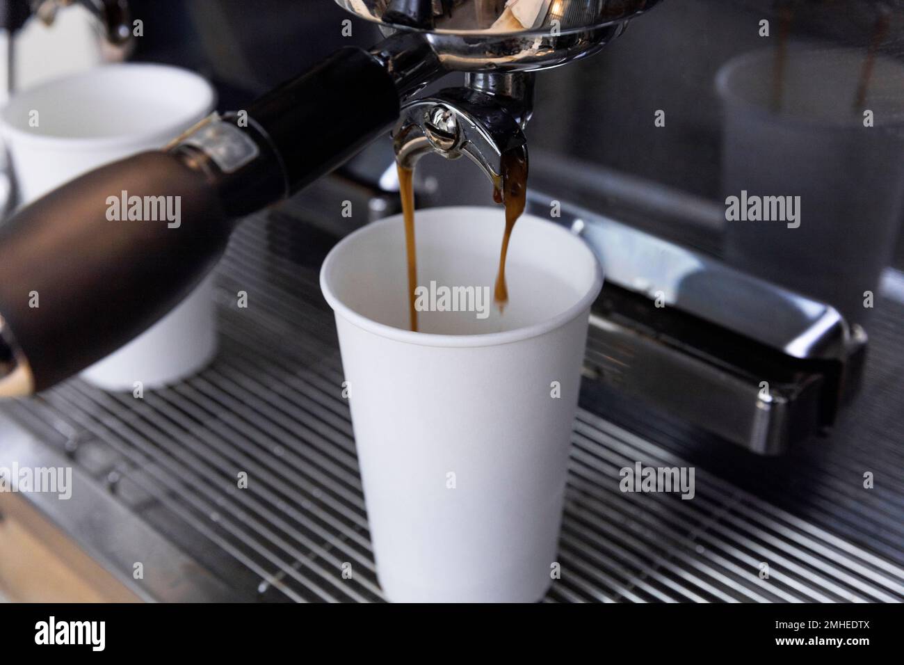 barista brewing, preparing coffee in cafe Stock Photo - Alamy