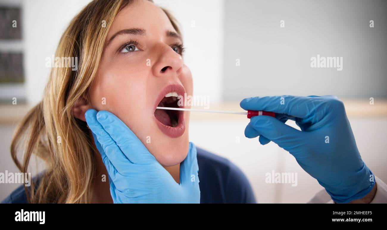Mouth Swab DNA Test For Disease. Saliva Check Stock Photo - Alamy