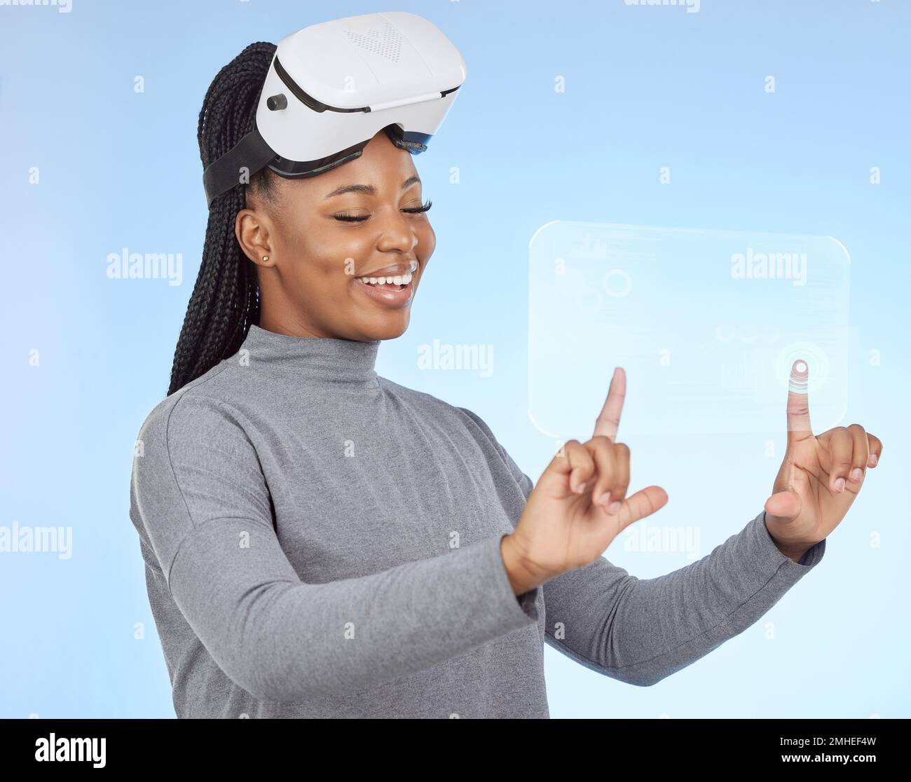 Black woman, virtual reality and touching futuristic display, hologram or screen against a blue ...