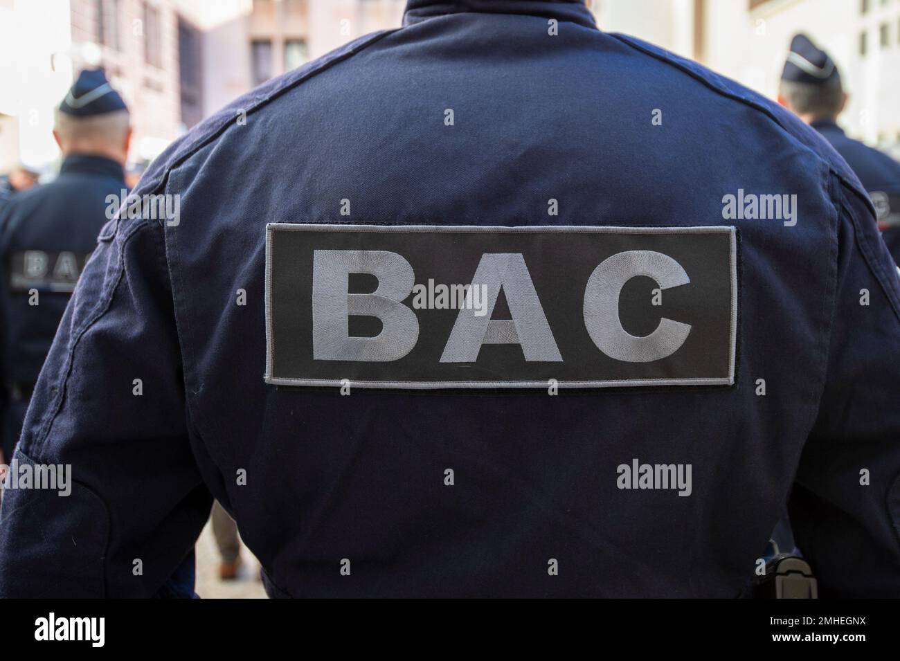 Members (not recognisable) of the BAC (Brigade Anti-Criminalite) with ...