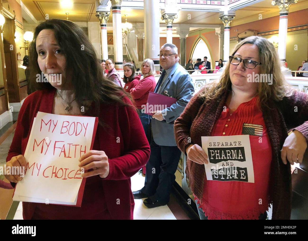 FILE - In this March 13, 2019 file photo, mothers Ariana Rawls, left ...