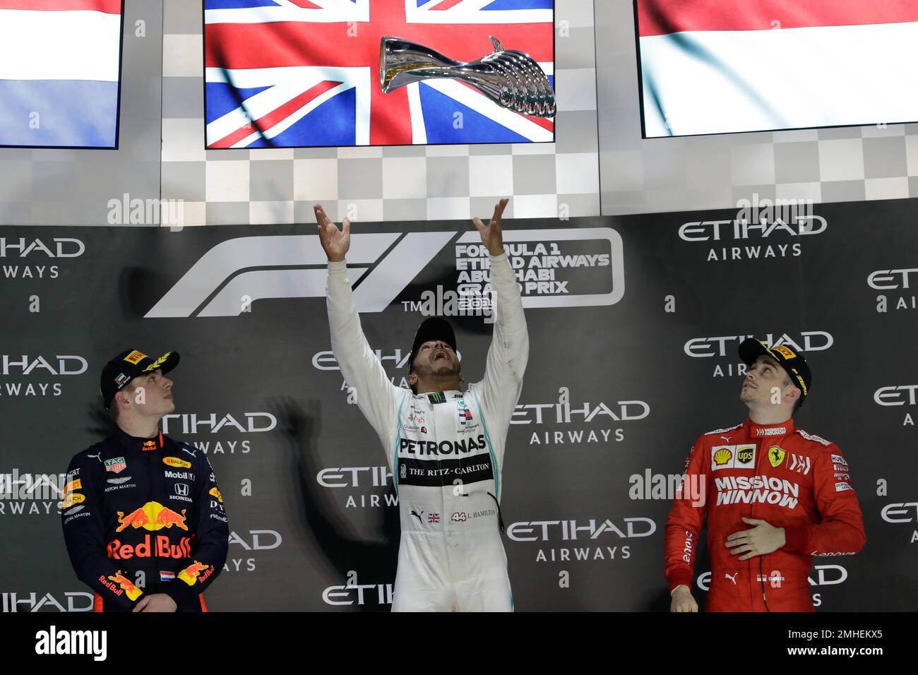 Mercedes driver Lewis Hamilton of Britain , centre, celebrates on the ...