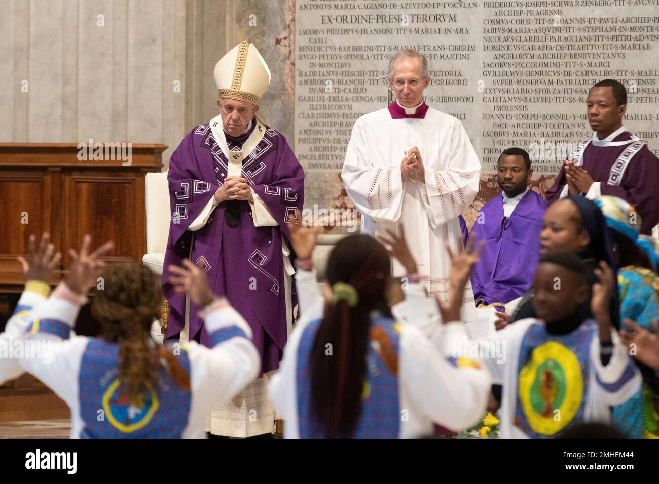 Faithful dance and sing in front of Pope Francis as he celebrates a ...